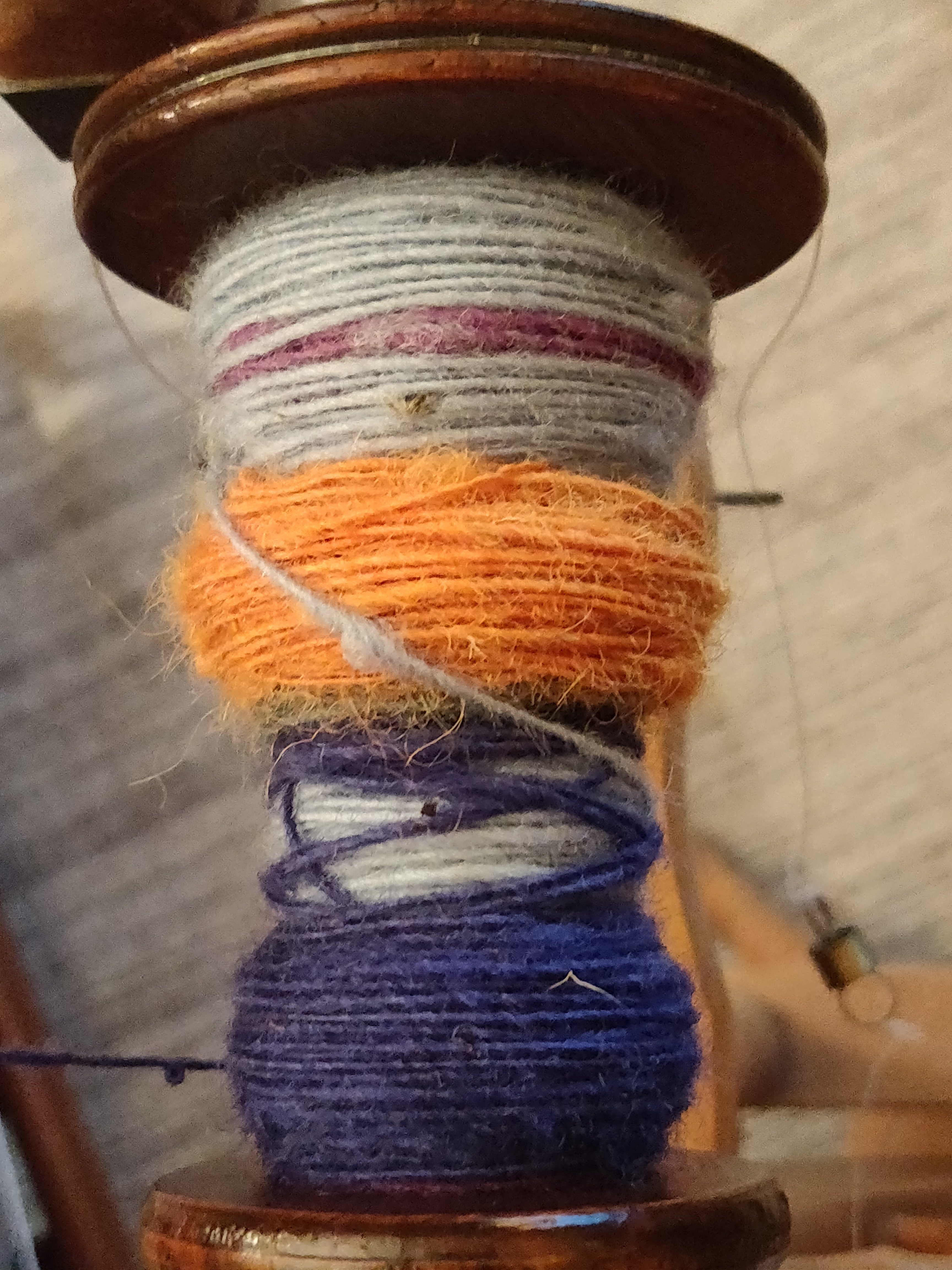 Colour-changing yarn spun from a distaff – Vikki Haffenden